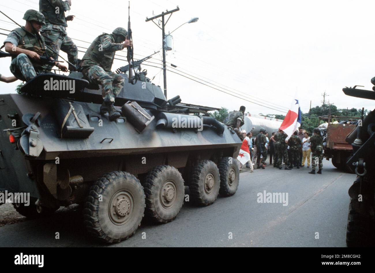 Marines of Company D, 2nd Light Armored Infantry Battalion, climb down ...