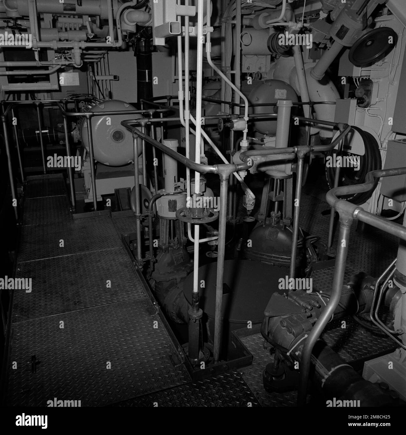 An interior view of Auxiliary Machinery Room No. 2 aboard the guided ...