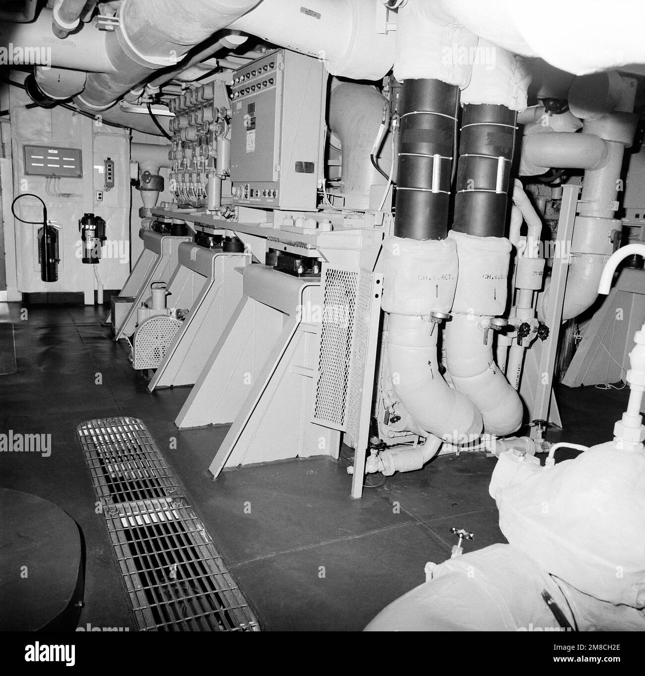 An interior view of Auxiliary Machinery Room No. 1 aboard the guided ...