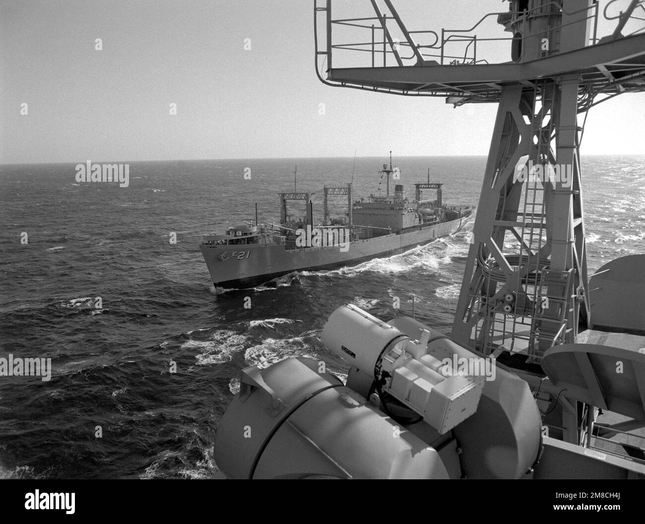 A port bow view of the ammunition ship USS SURIBACHI (AE-21) coming ...