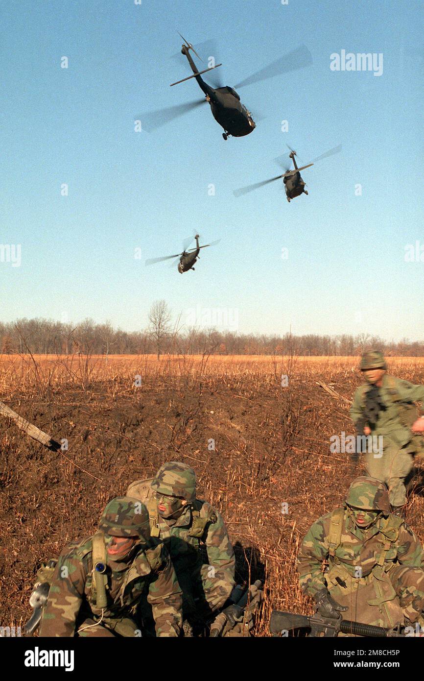 Soldiers of 2nd Bn., 502nd Inf. Regt., 101st Airborne Div., move out ...