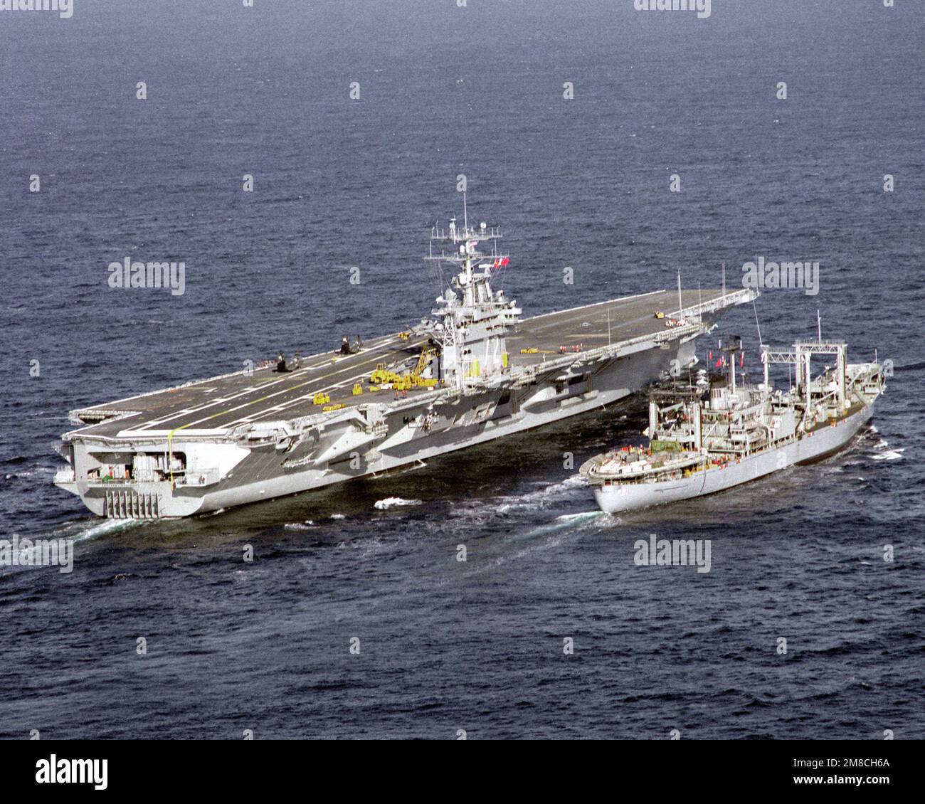 A starboard quarter view of the ammunition ship USS SURIBACHI (AE-21 ...