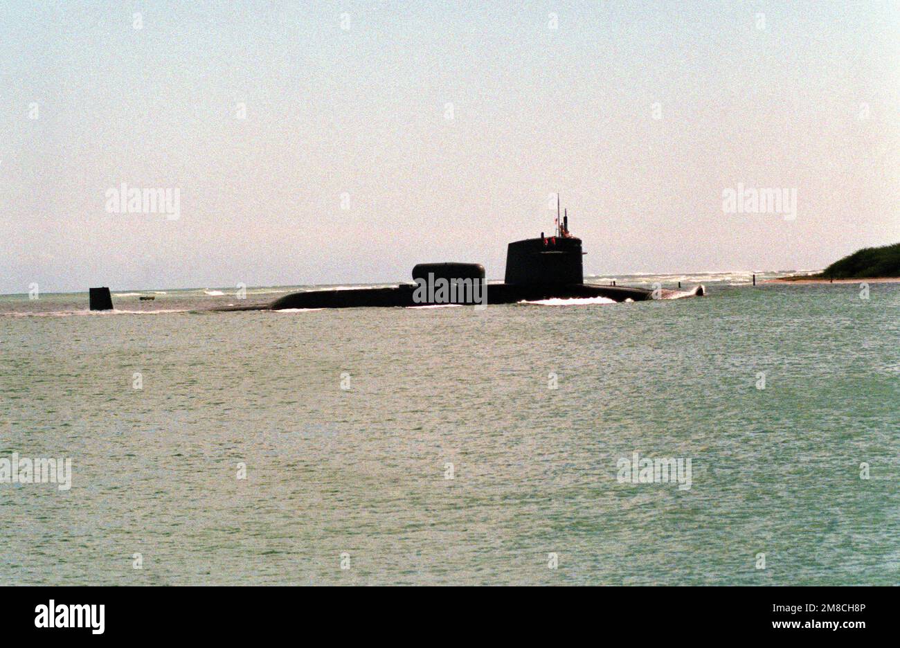 A starboard beam view of the nuclear-powered attack submarine USS SAM ...
