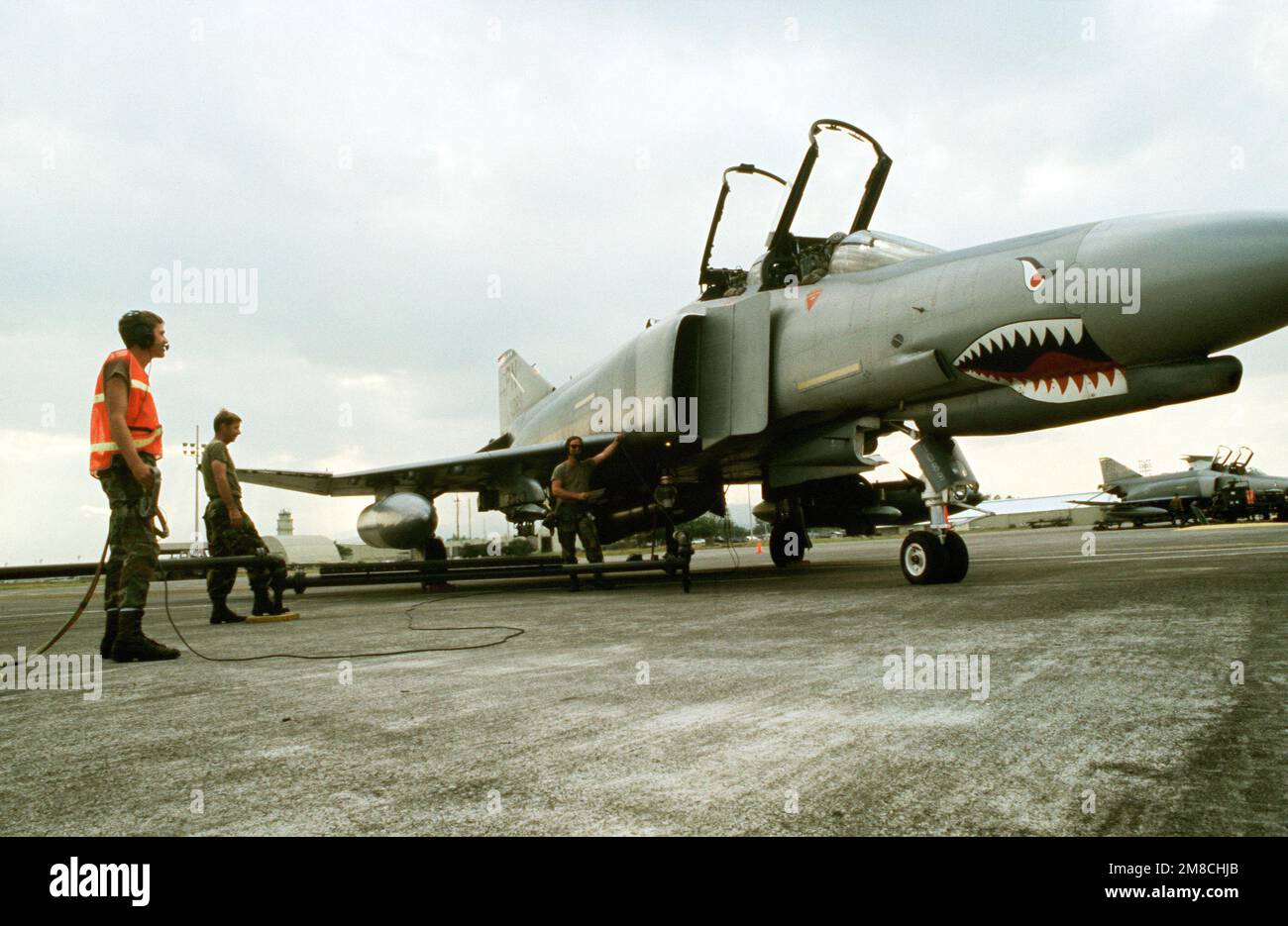 Ground crewmen refuel a 3rd Tactical Fighter Wing F-4E Phantom II ...