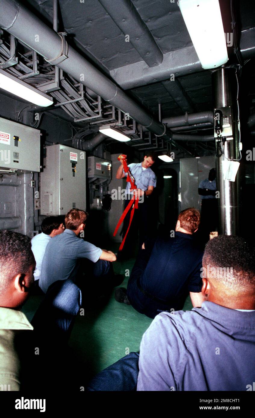 Electronics Technician 3rd Class Patt discusses the use of a safety ...