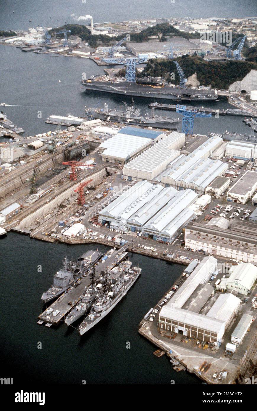 An aerial view of the Yokosuka ship repair facility and surroundings ...