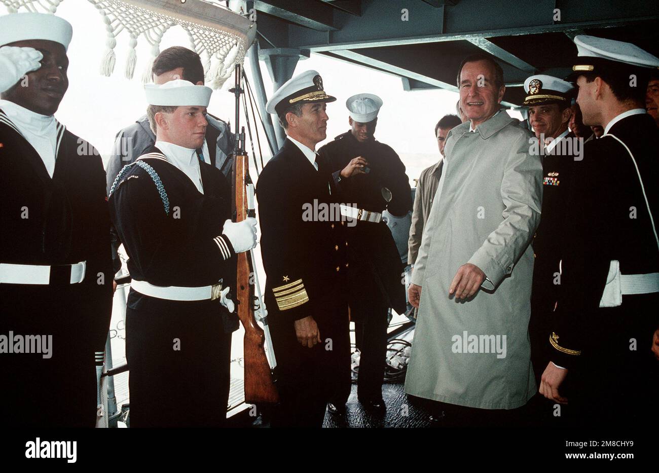 President George H.W. Bush shares a lighter moment with Sixth Fleet ...