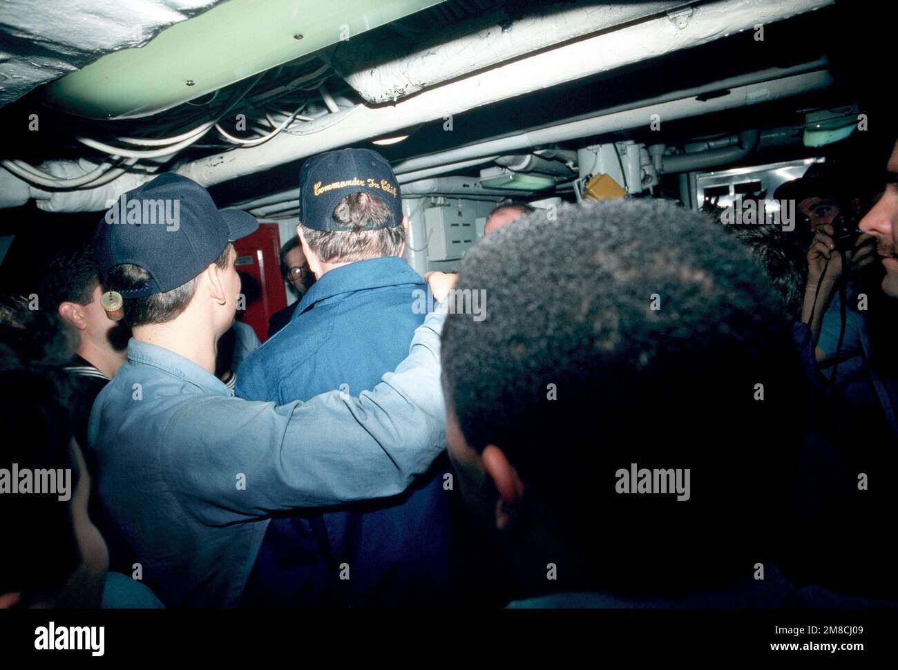 Sailors greet President George H.W. Bush aboard the guided missile ...
