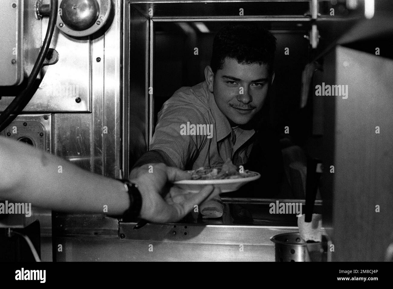 Mess Management SPECIALIST SEAMAN Apprentice Scott Thomas works in the ...