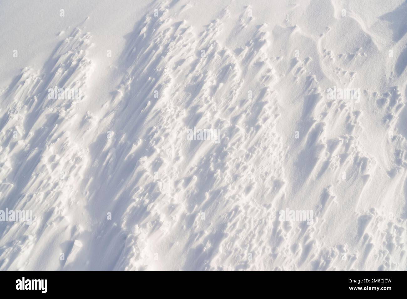 Snow texture, frozen snow formed by a blizzard Stock Photo - Alamy