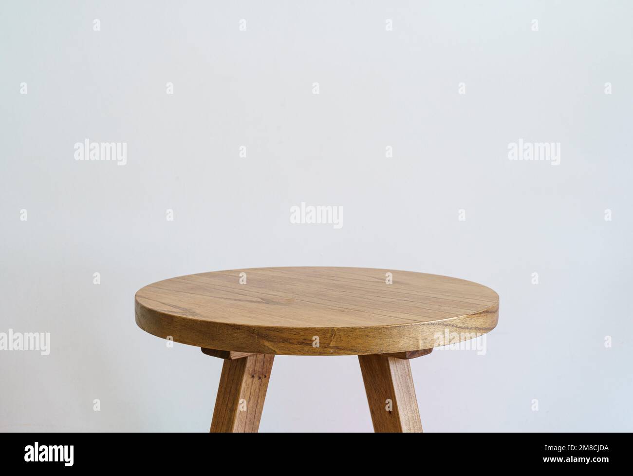 Round wooden table isolate on empty background. Wooden table surface ...