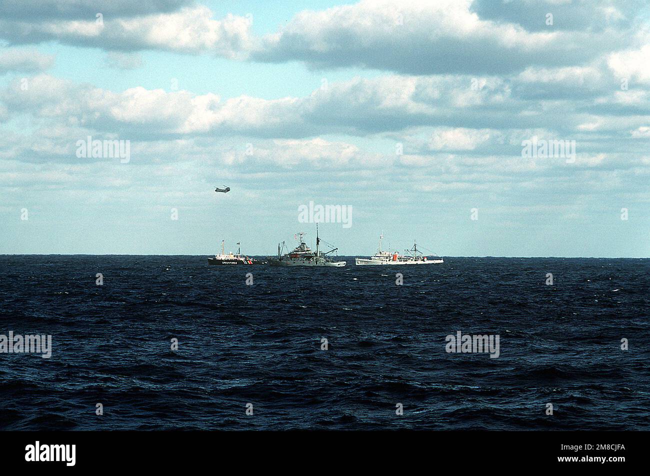 The submarine rescue ship USS KITTIWAKE (ASR-13) and the salvage ship ...