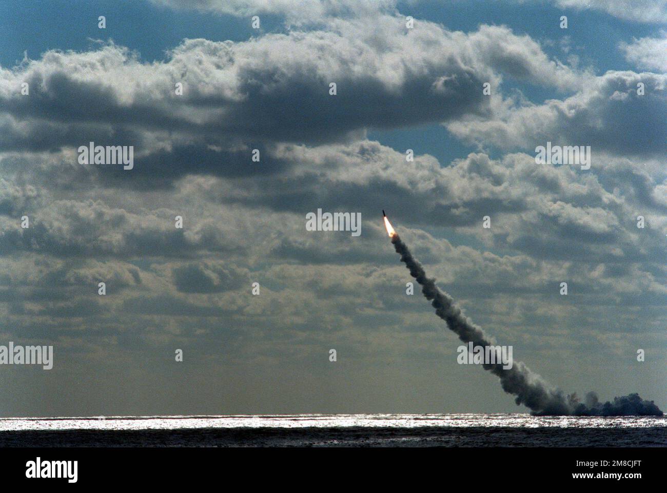 A Trident II D-5 intercontinental ballistic missile lifts off from the ...