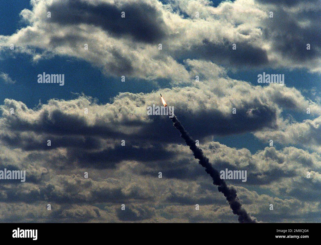 A Trident II D-5 intercontinental ballistic missile lifts off after ...