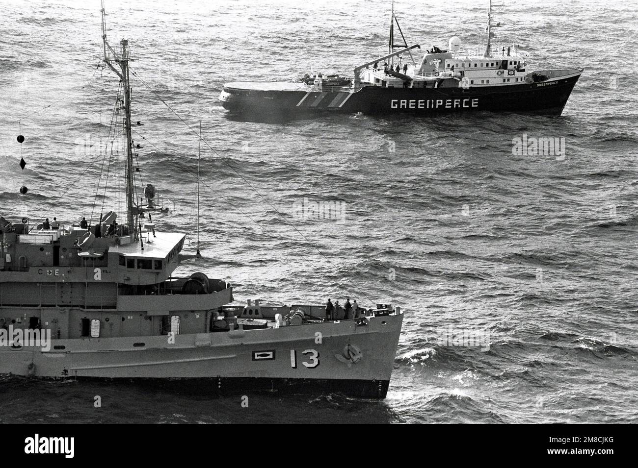 The submarine rescue ship USS KITTIWAKE (ASR-13) stands off the ...