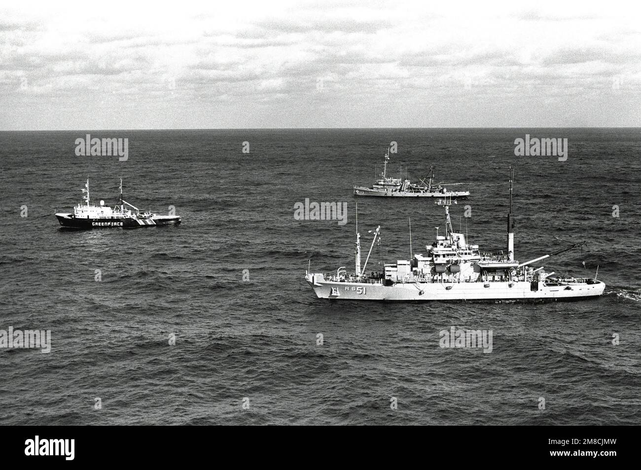 The salvage ship USS GRASP (ARS-51), foreground, and the submarine ...