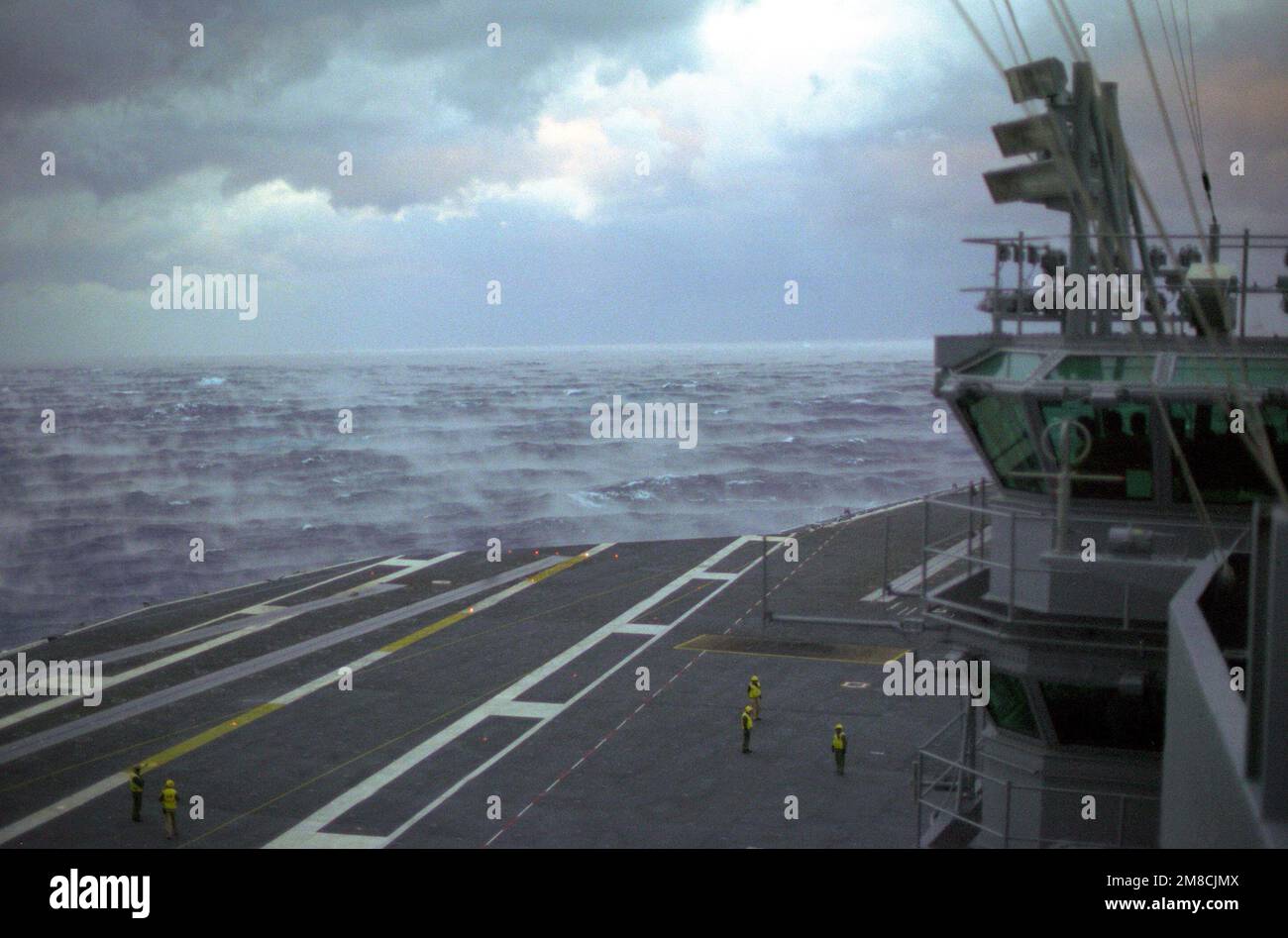 A view of a section of the flight deck and superstructure of the ...