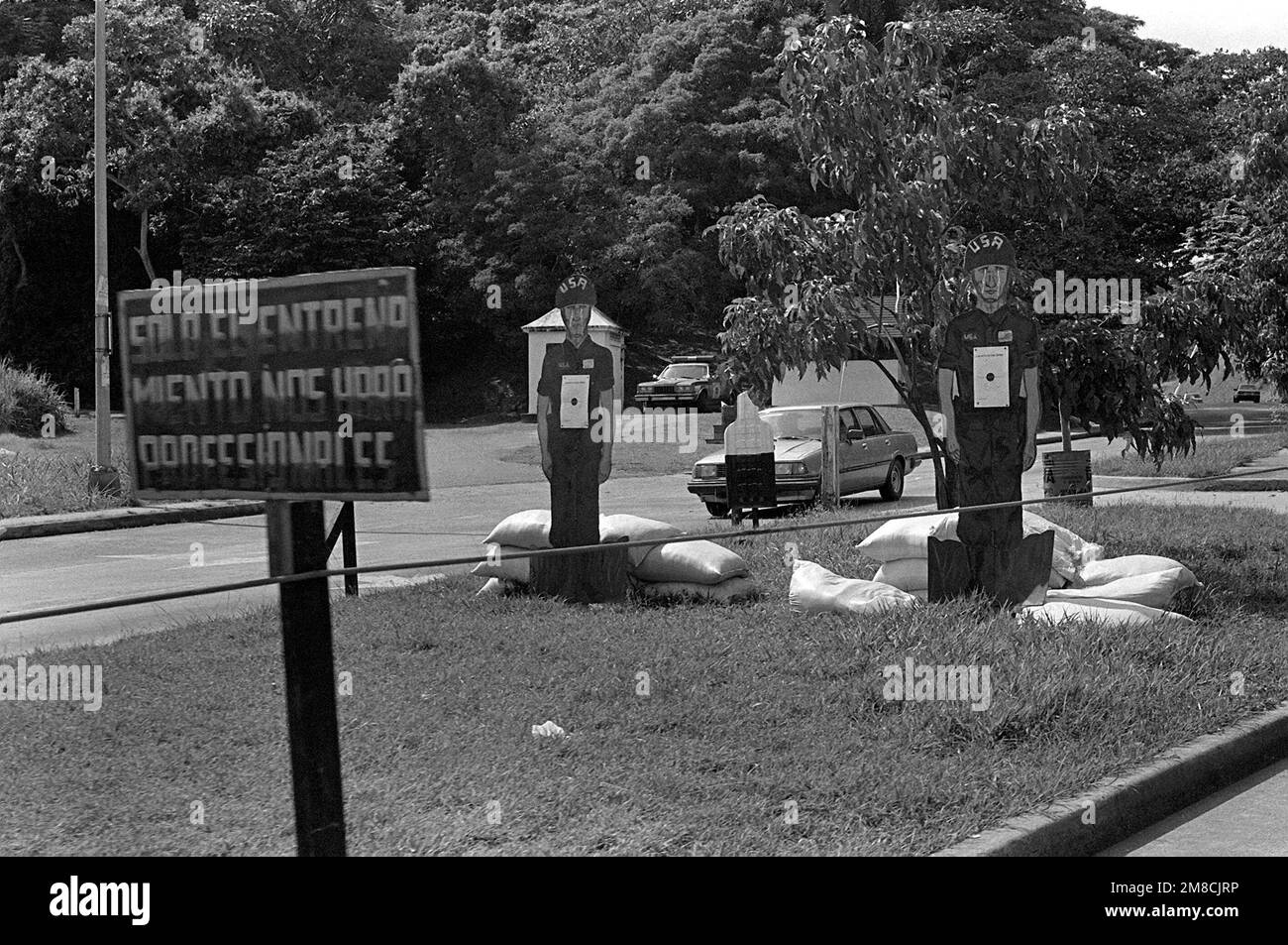 Wooden effigies representing US Army General Maxwell R. Thurman ...