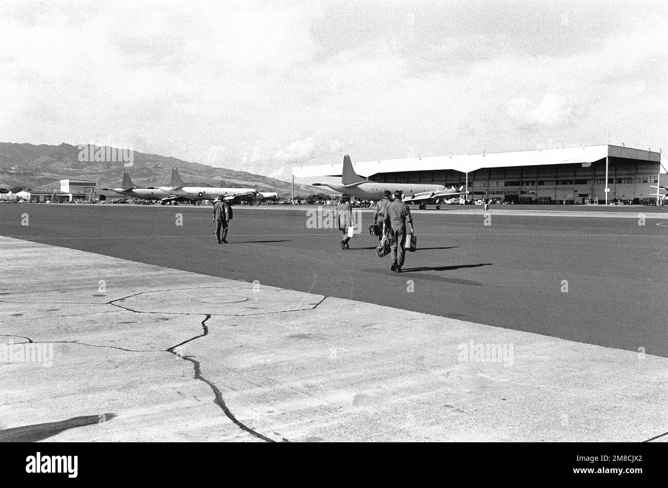 Members of Naval Air Reserve Patrol Squadron 64 (VP-64) walk to their P ...