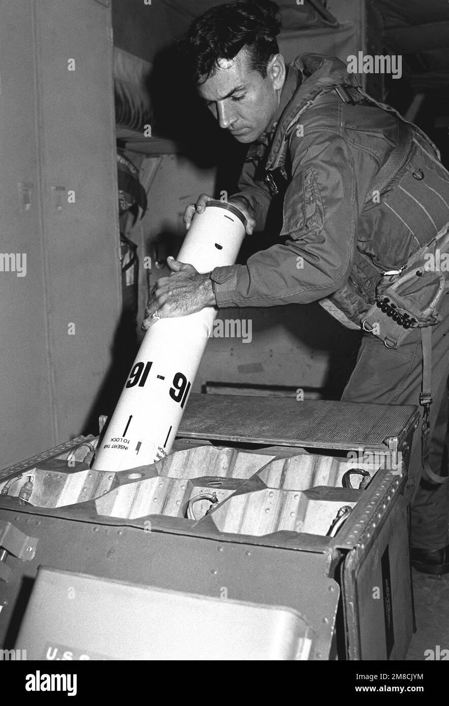 A member of Naval Air Reserve Patrol Squadron 64 (VP-64) on active duty ...