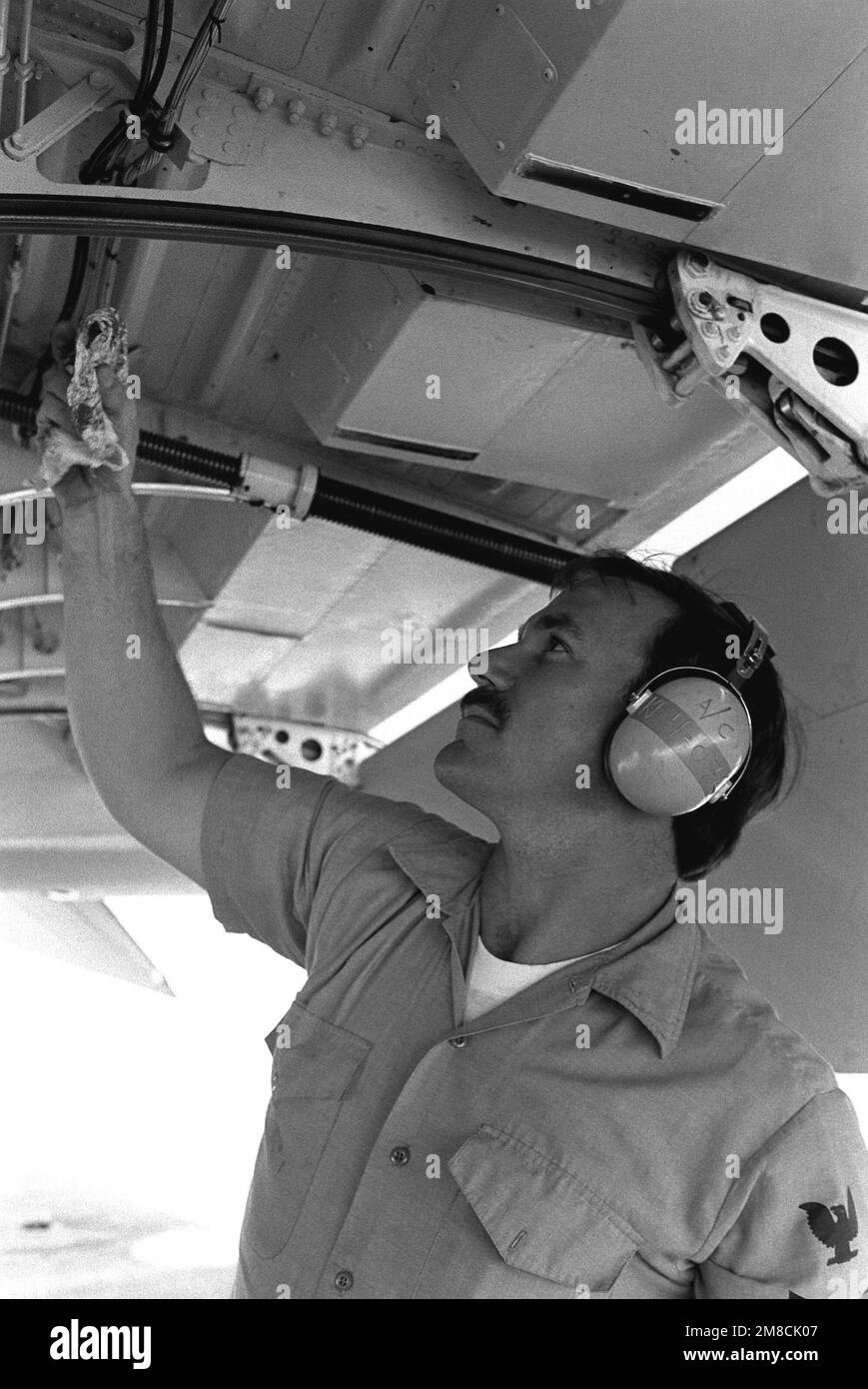 A non-commissioned officer of a Naval Air Reserve Patrol Squadron 64 ...