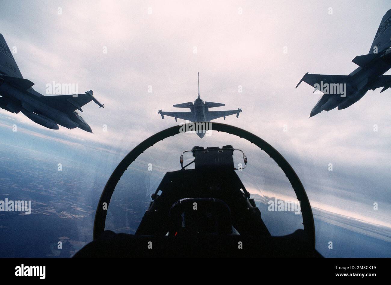 Three F-16 Fighting Falcon aircraft of the 169th Tactical Fighter Group ...