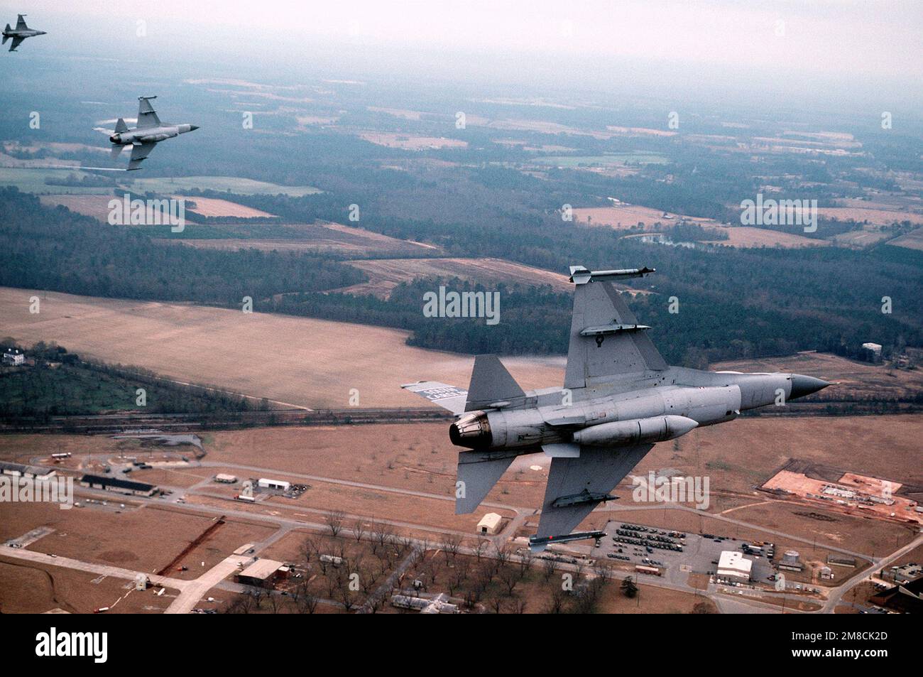 Three F-16 Fighting Falcon aircraft of the 169th Tactical Fighter Group ...