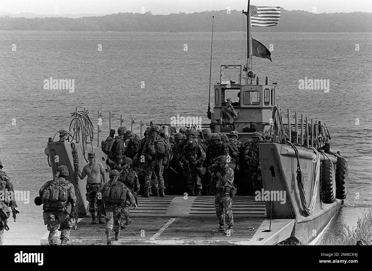 Soldiers of the 82nd Airborne Division board an Army LCM-8 mechanized ...