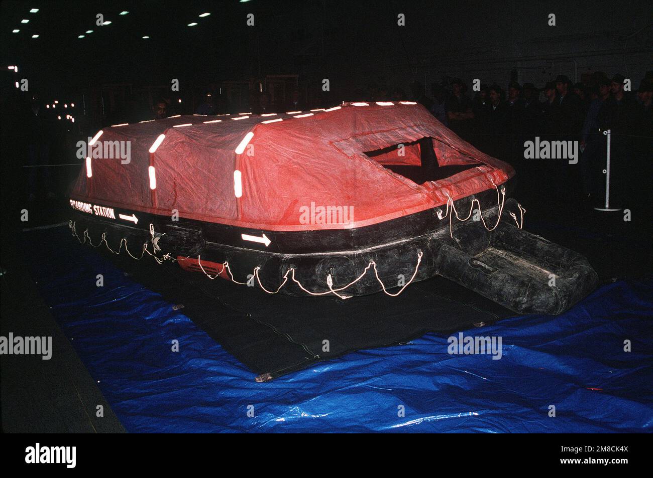 A close-up view of a fully-inflated lifeboat during a demonstration of ...