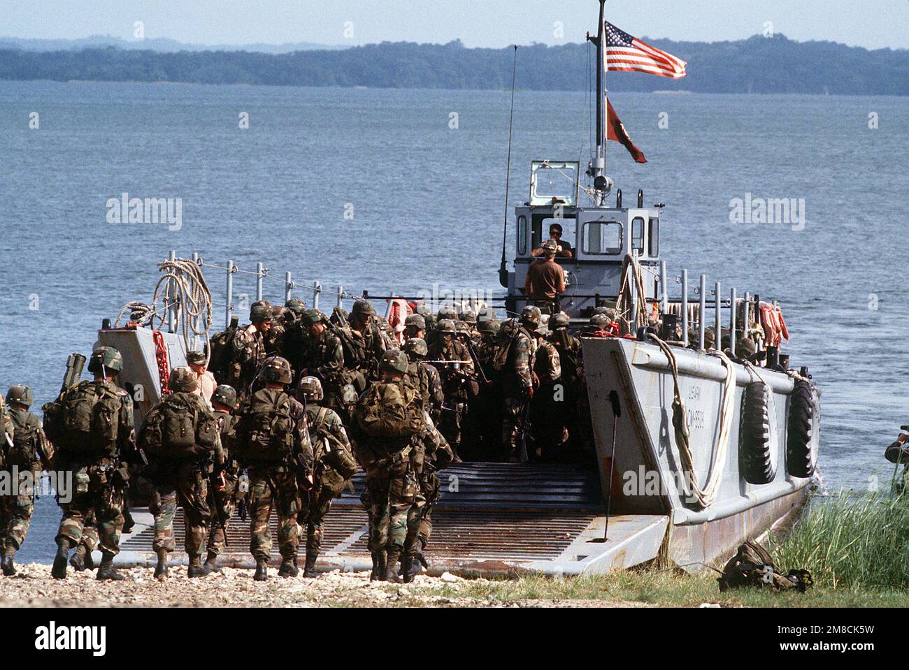 Soldiers of the 82nd Airborne Division board an Army LCM-8 mechanized ...