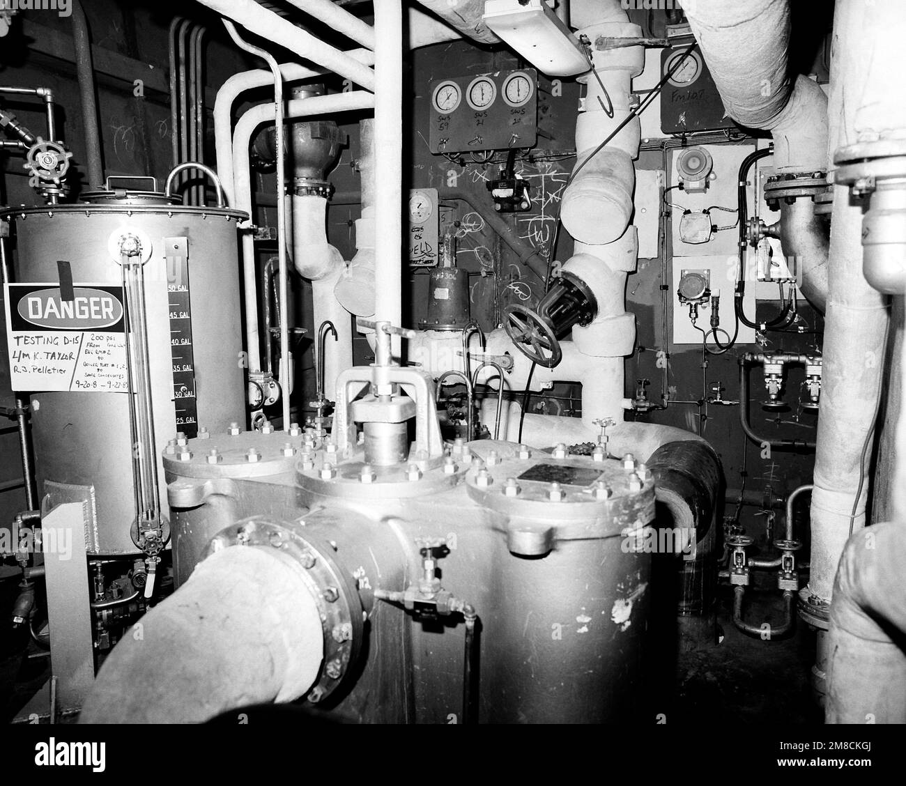 A view of main engine room No. 1 aboard the guided missile cruiser ...