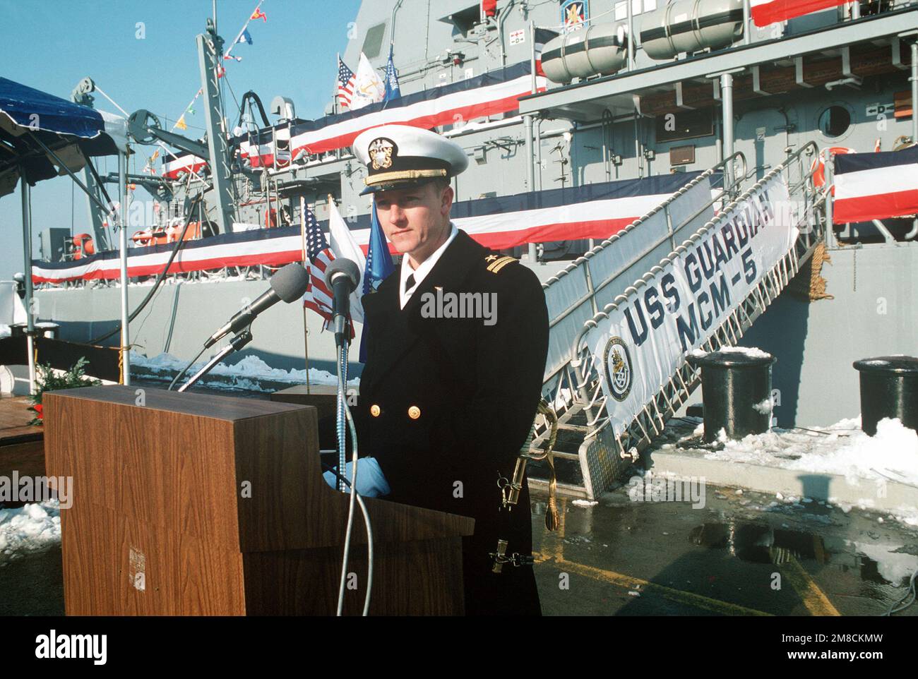 Lieutenant Jeffrey R. Howlett, Executive Officer, sets the first watch ...