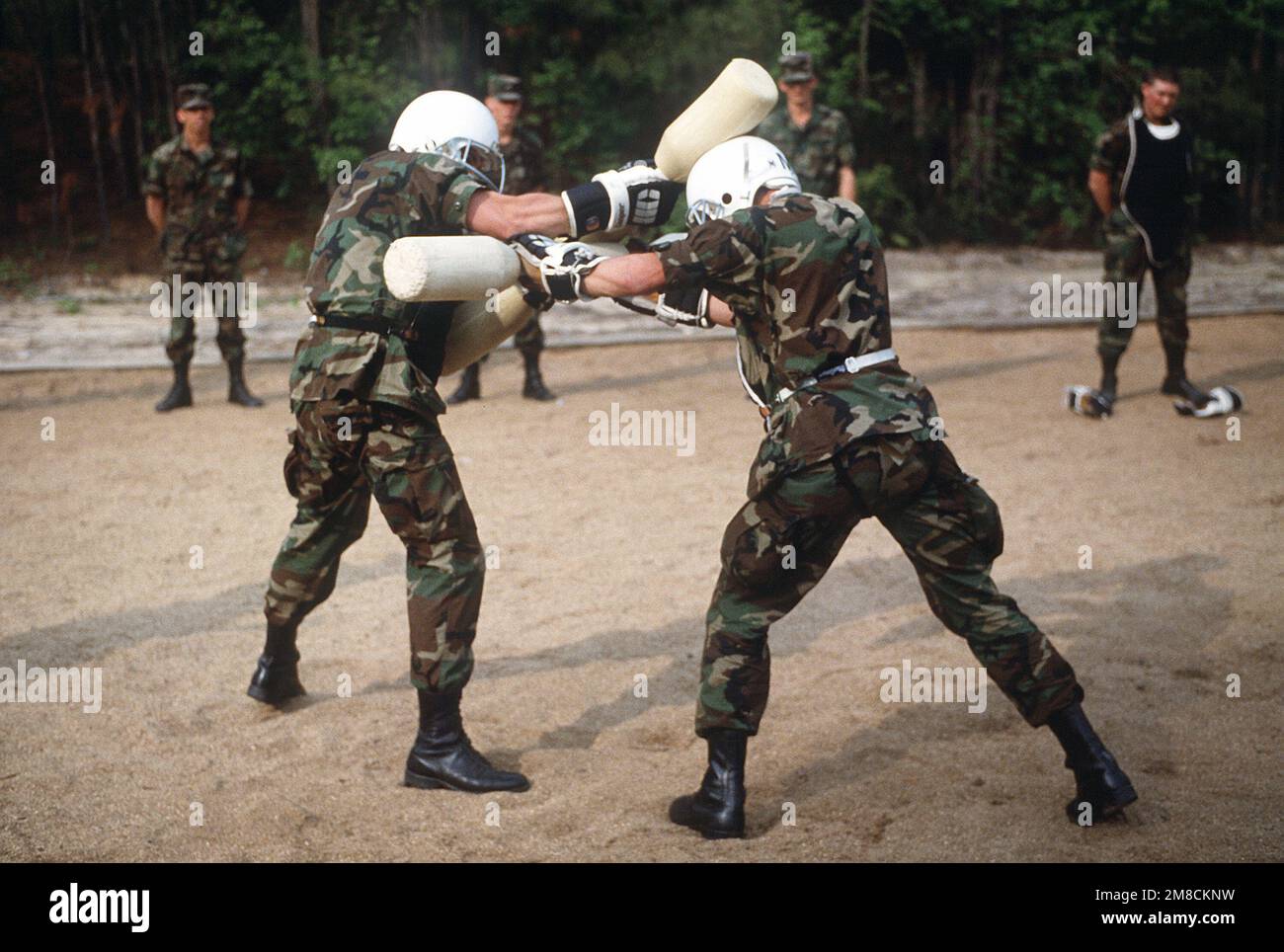 Two soldiers participate in pugil stick training. Base: Fort Jackson ...