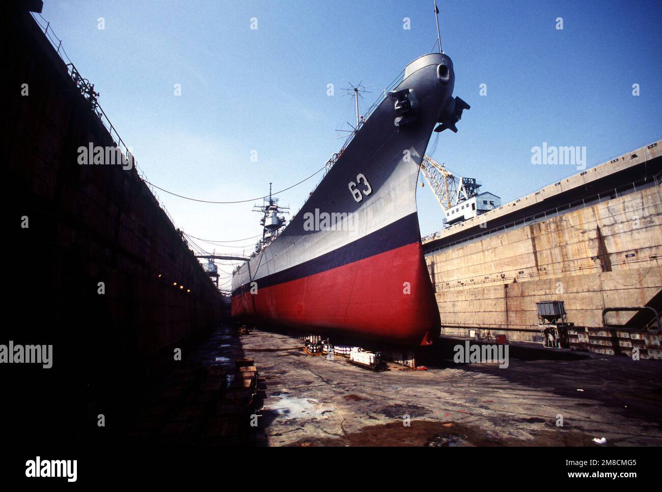 The battleship USS MISSOURI (BB-63) lies in dry dock for hull painting ...