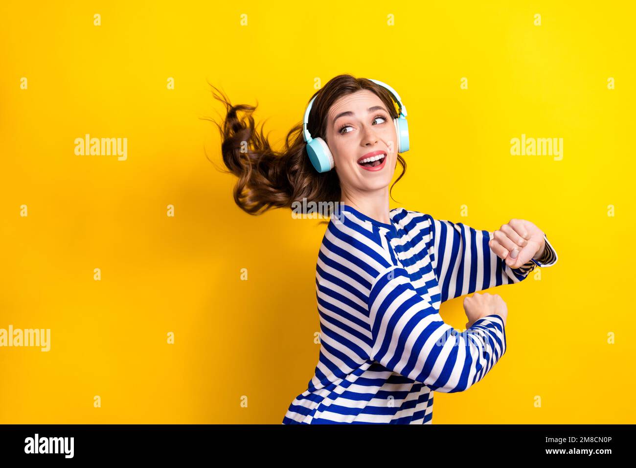 Photo portrait of attractive young woman headphones look empty space ...