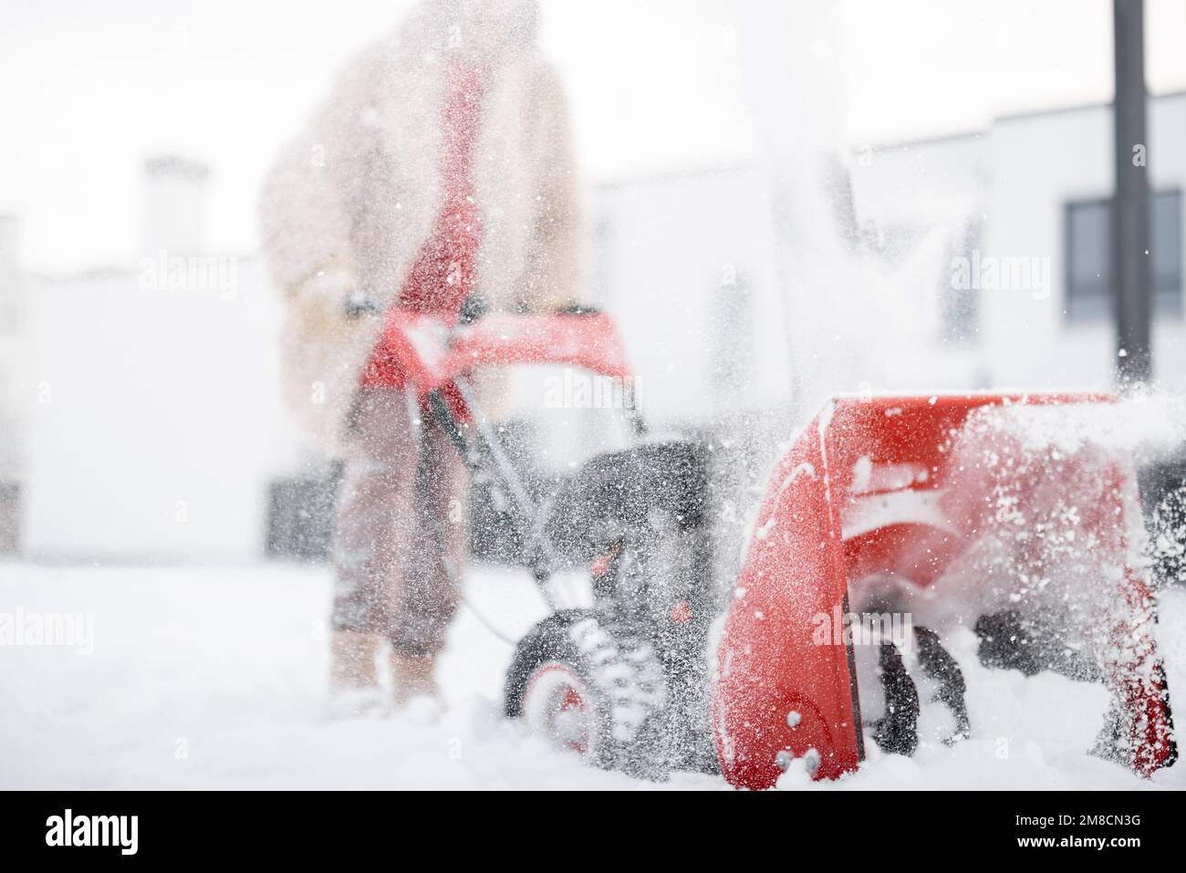 Snow thrower machine in work Stock Photo - Alamy