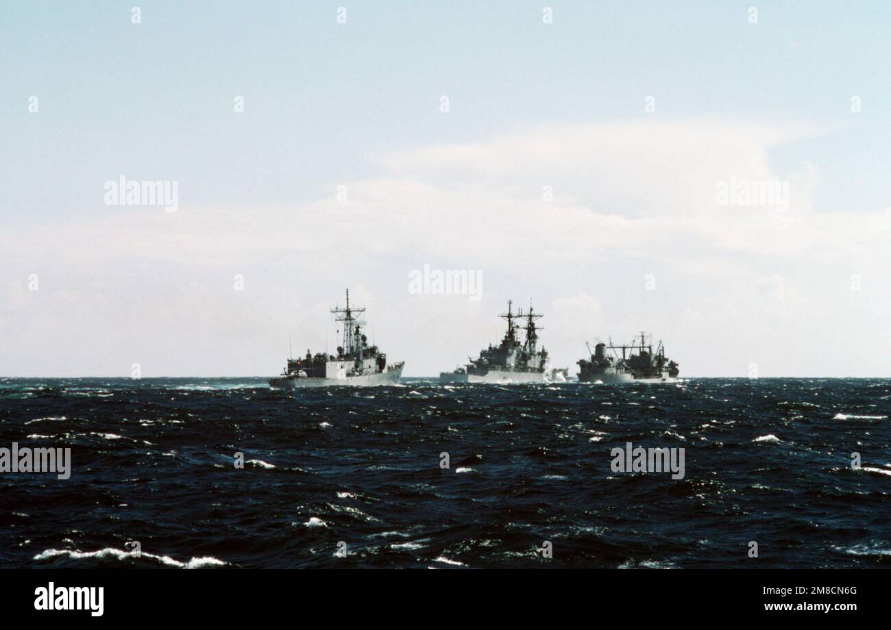 The guided missile frigate USS STEPHEN W. GROVES (FFG 29) approaches as ...