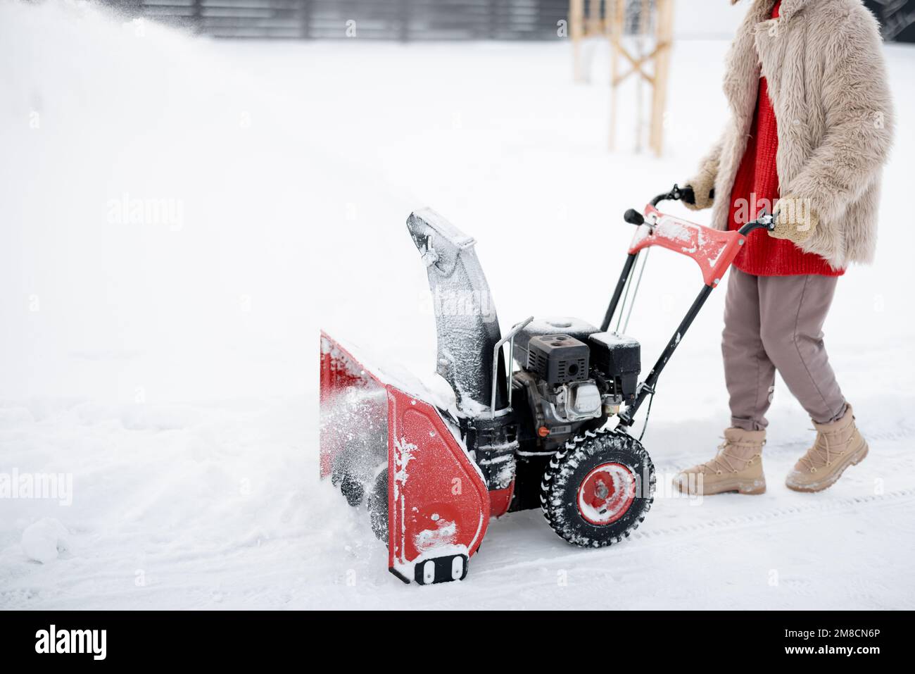 Snow thrower machine in work Stock Photo - Alamy