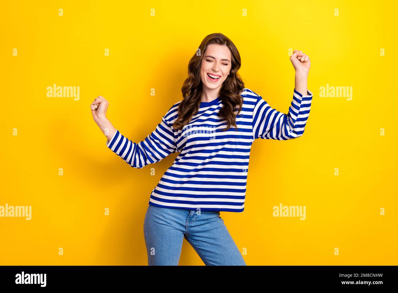 Photo of young overjoyed excited funny positive woman raise fists up ...