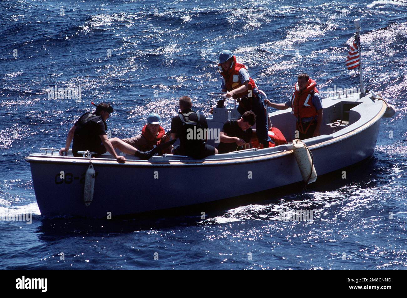 Crew members from the guided missile cruiser USS JOSEPHUS DANIELS (CG ...