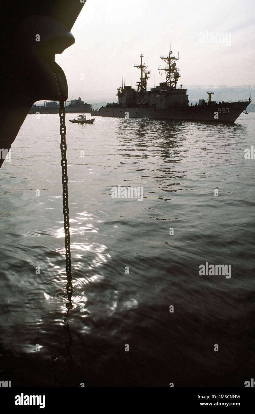 The destroyer USS HAYLER (DD-997) lies at anchor with other task force ...