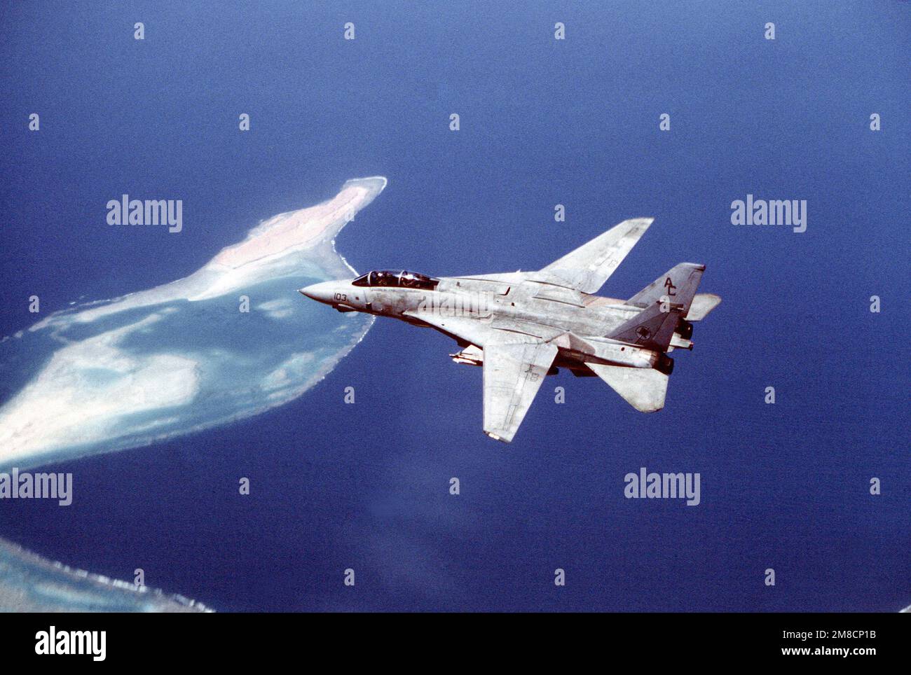 A Fighter Squadron 14 (VF-14) F-14A Tomcat aircraft passes over the ...
