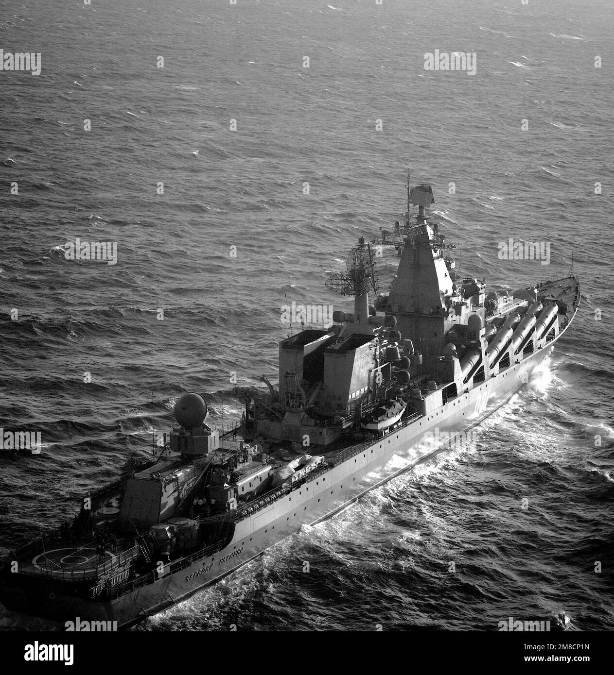 A starboard quarter view of the Soviet Slava class cruiser Chervona ...