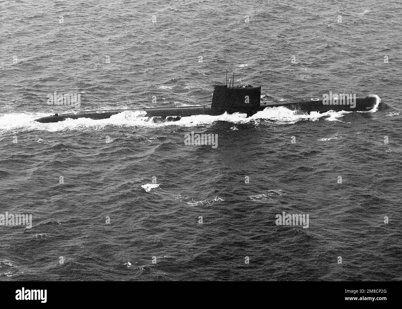 A starboard beam view of a Soviet Tango class patrol submarine underway ...