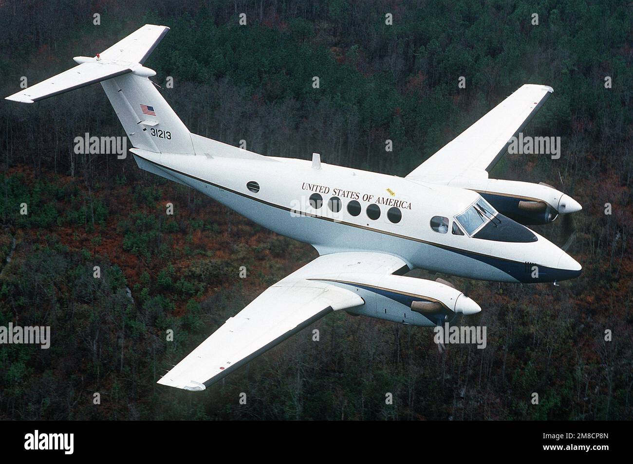 An air-to-air right front view of an 89th Military Airlift Wing C-12C ...