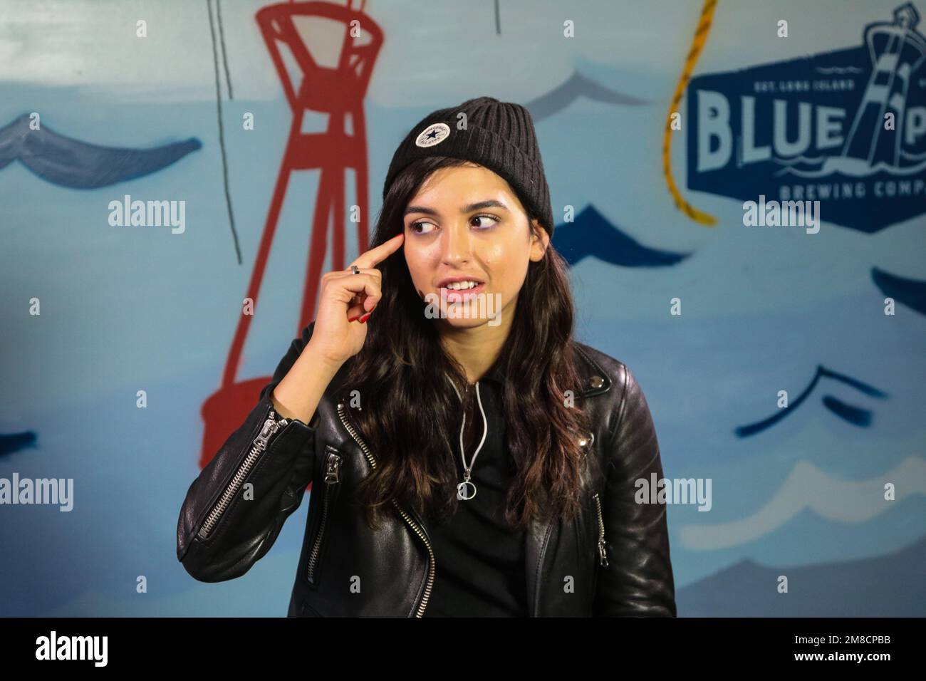 Jess Kent films an interview in Brooklyn Stock Photo - Alamy