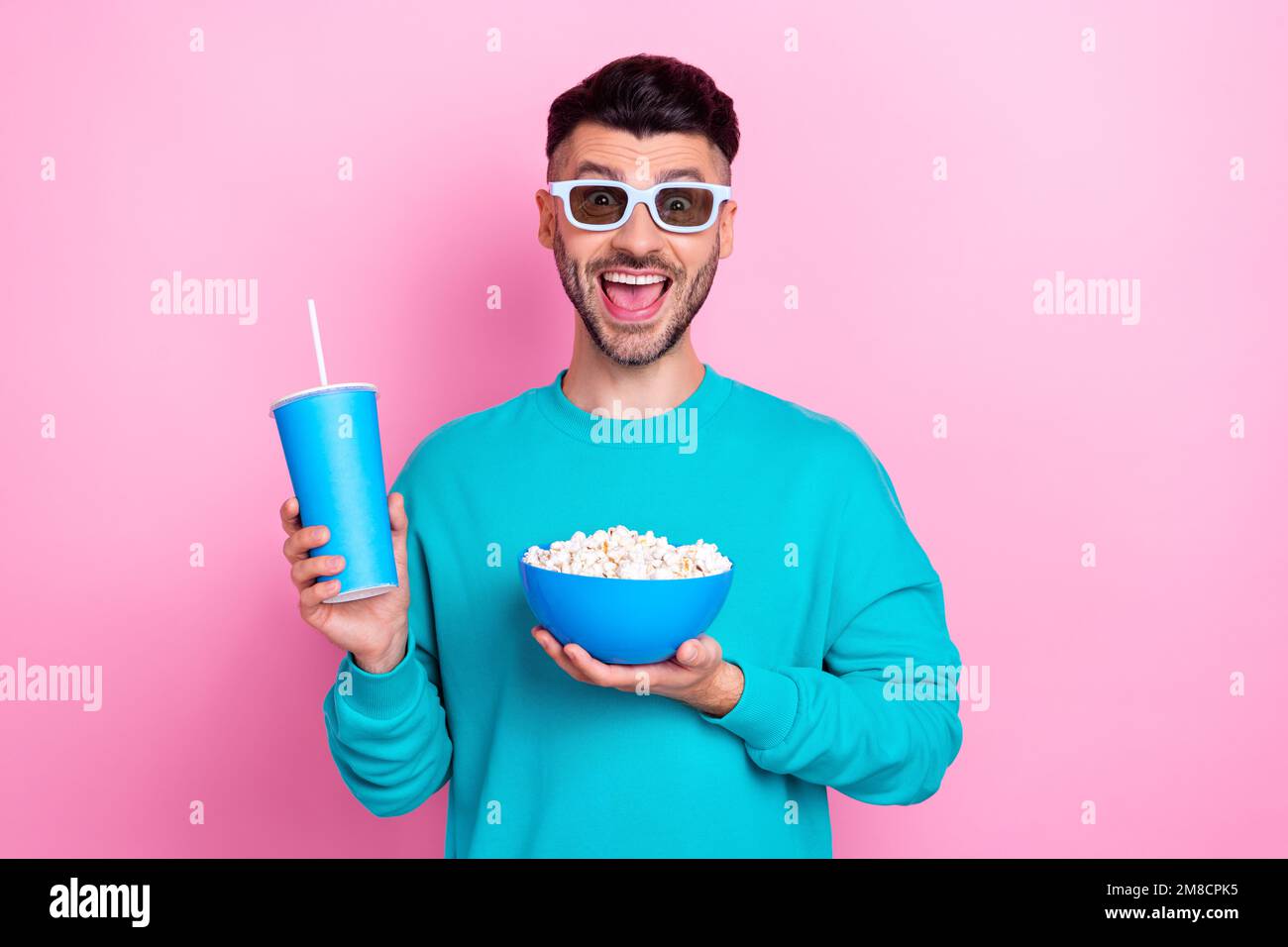 Photo of young handsome guy open mouth laughing watching his favorite ...