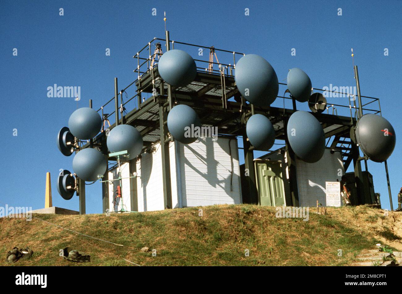 Antennas cover the range operations bunker during Exercise Cope Thunder ...