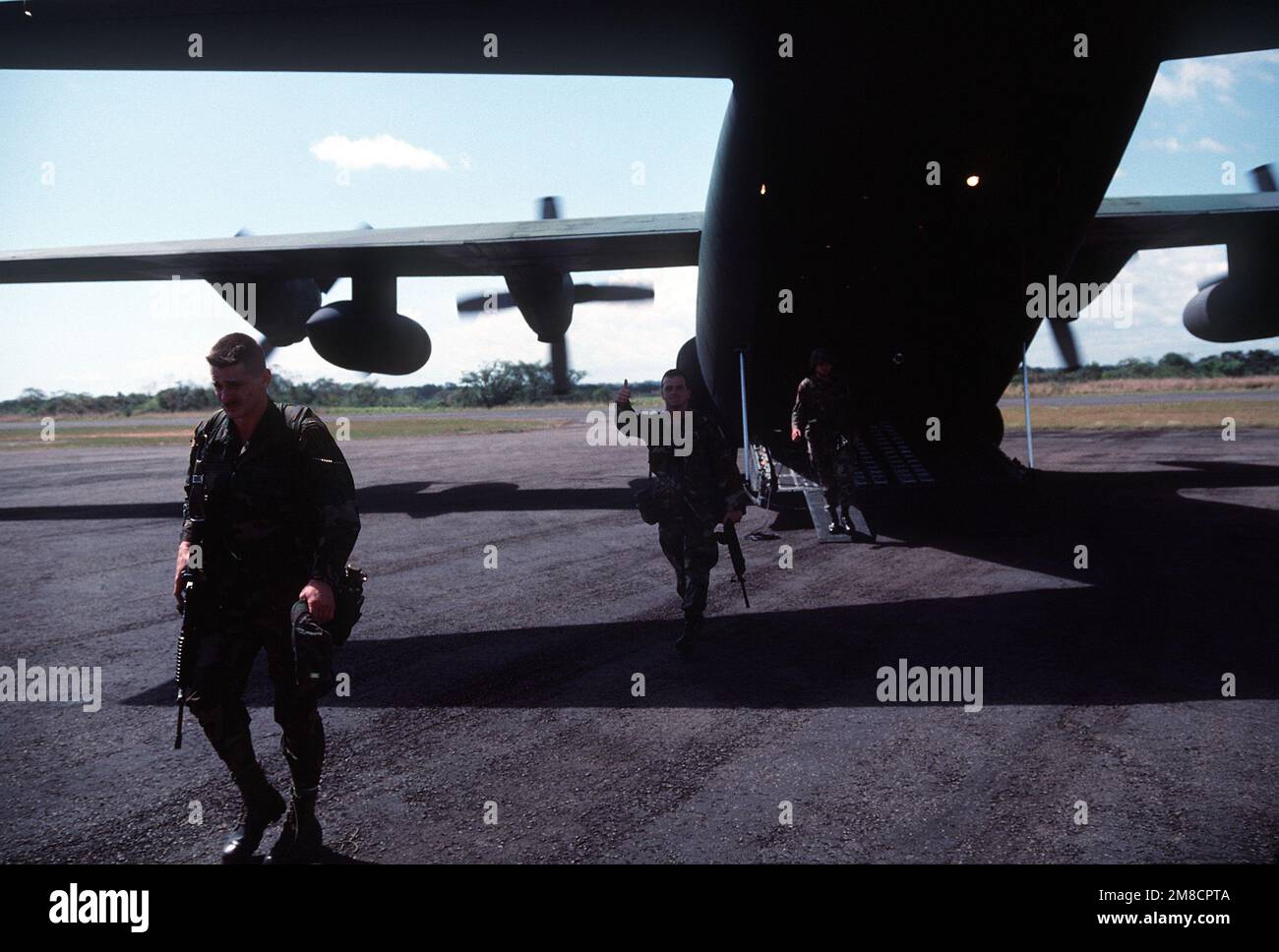 Members of 1ST Battalion, 509th Infantry, disembark from a 934th ...
