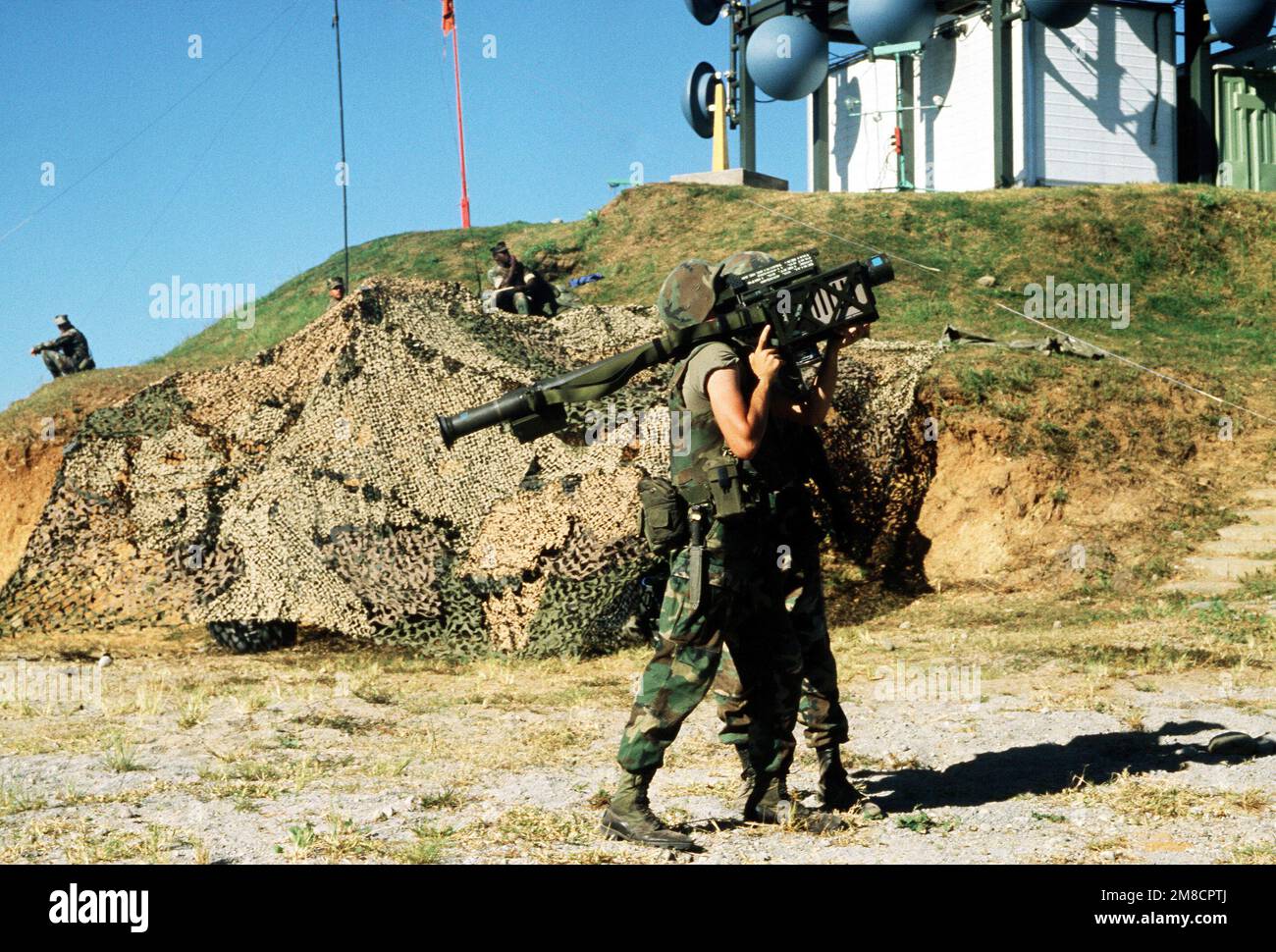 U.S. Marines practice sighting on incoming aircraft with a Stinger ...